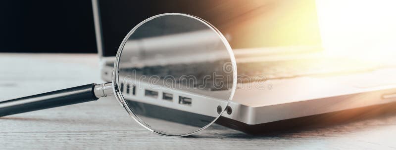 Laptop Computer with Magnifying Glass Stock Image - Image of ...
