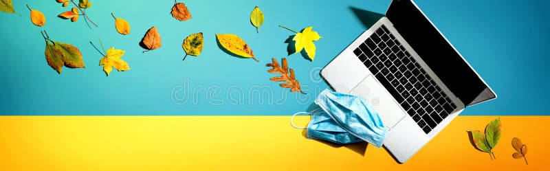 Laptop Computer with Masks in Autumn Stock Photo - Image of fall ...