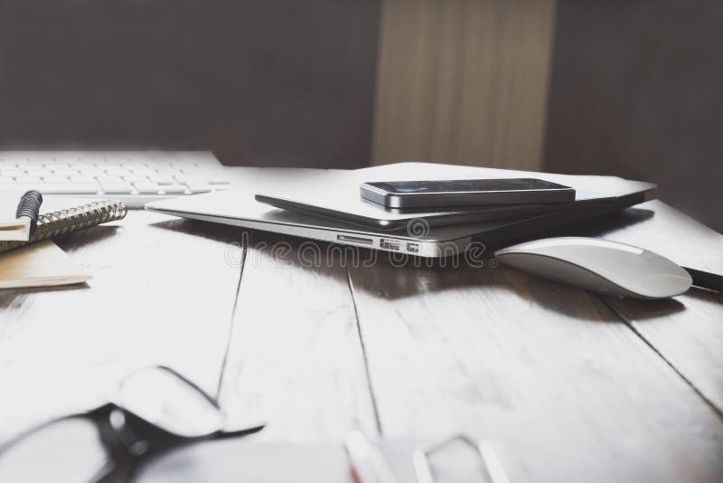 Laptop Computer, Mobile Phone and Tablet on Office Desk Stock Photo ...