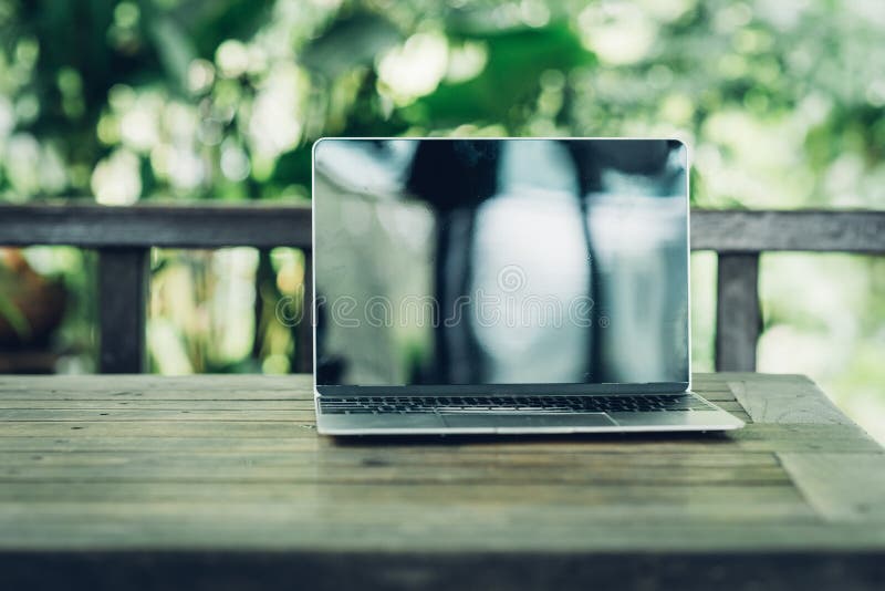 Laptop Computer Mockup Has Empty Screen Outside on Table Stock Image ...