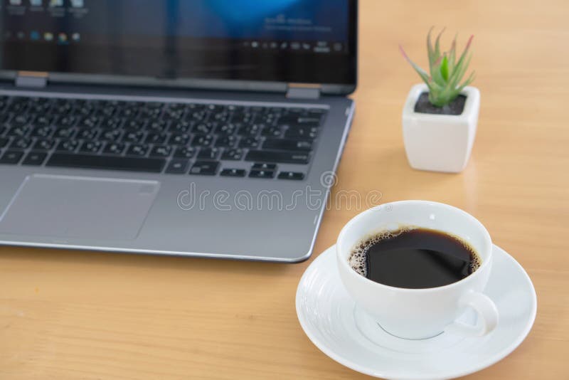 Laptop Computer and Note Paper with Coffee Cup on the Table Stock Photo ...