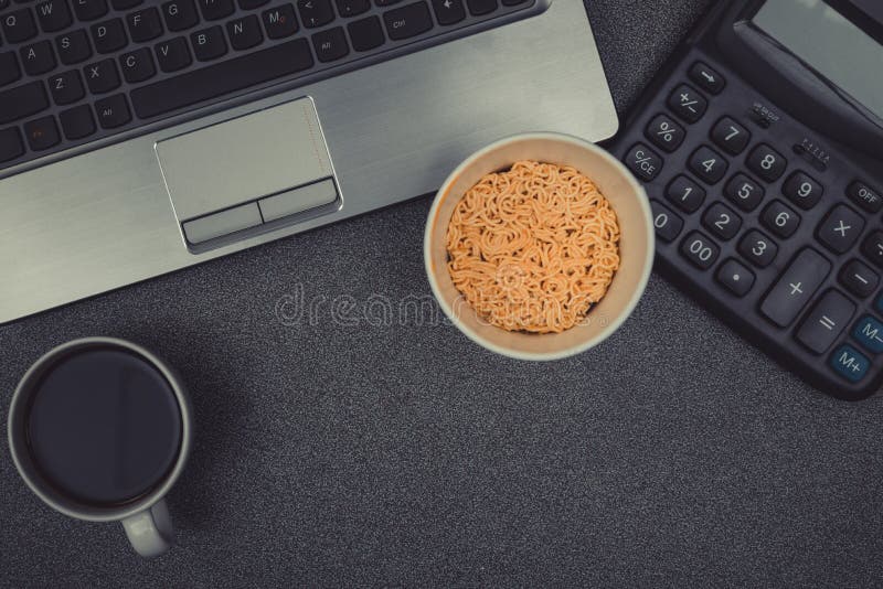 Laptop Computer or Notebook, Calculator and Cup of Coffee on Working ...