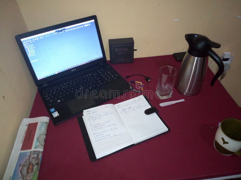 Laptop Computer with Notebook and Drink and Perfume and Remote ...