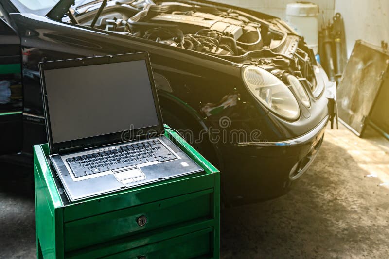Laptop or Computer Notebook Interfaced with Car for Repair during Work ...