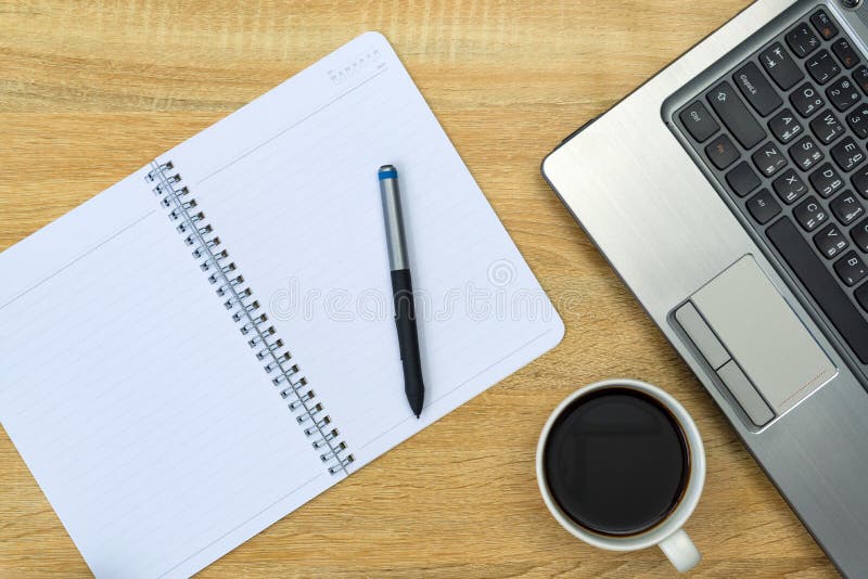 Laptop Computer or Notebook, Note and Cup of Coffee on Working Table ...