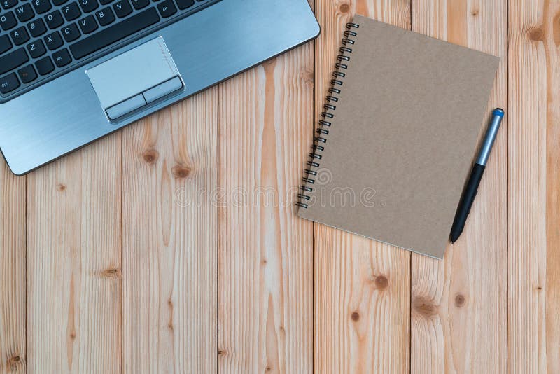 Laptop Computer or Notebook and Note on Working Table with Copy Space ...