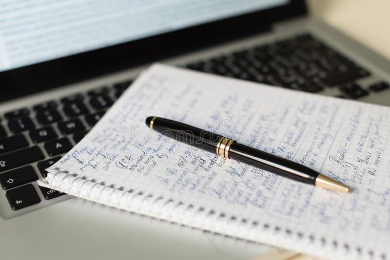 Laptop Computer with Notepad, Pen on Ivory Table Stock Image - Image of ...