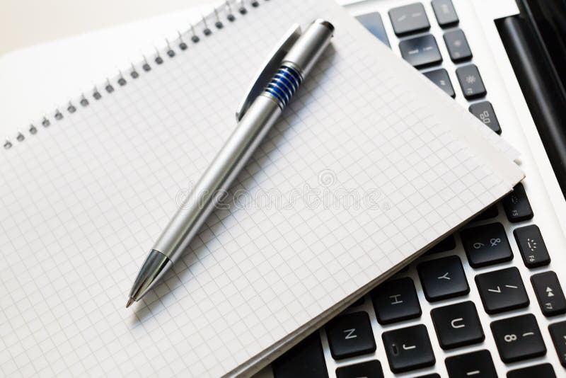 Laptop Computer with Notepad, Pen on Ivory Table Stock Image - Image of ...