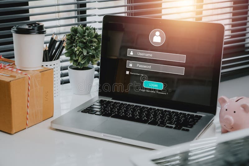 Laptop Computer on Office Desk with Login and Password on Screen ...