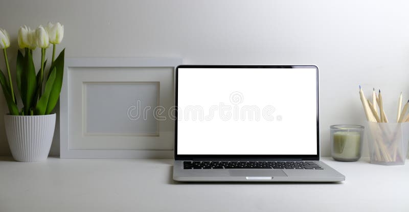 Laptop Computer, Picture Frame and Vase with Bouquet of Beautiful ...