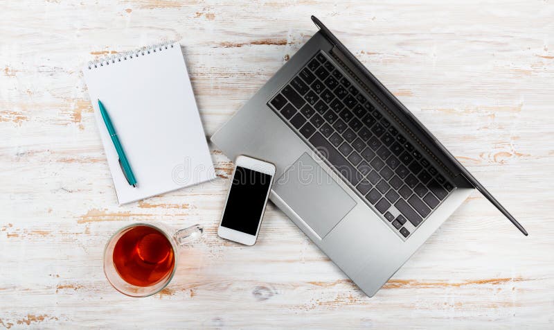 Laptop Computer, Planner, Mobile Smartphone and Cup of Tea Stock Image ...
