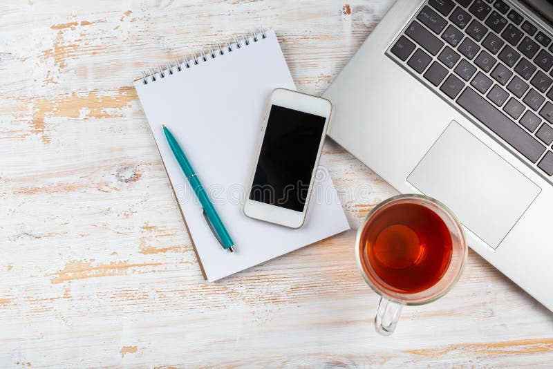 Laptop Computer, Planner, Mobile Smartphone and Cup of Tea Stock Photo ...