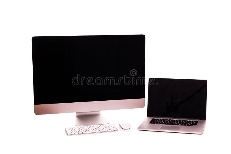 Laptop and Computer Screen on a White Table with Reflection on White ...