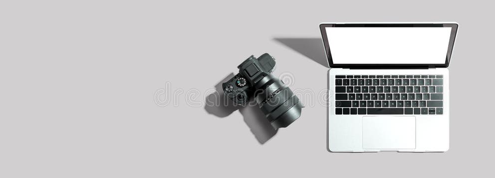 Laptop Computer with a SLR Camera Stock Photo - Image of gear, camera ...