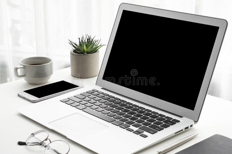 Laptop Computer and Smartphone with Blank Mock Up Screens are on Top of ...