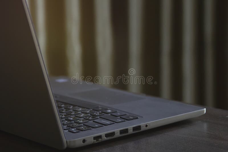 A Laptop Computer on the Table in Room. and Used in Business Concept ...