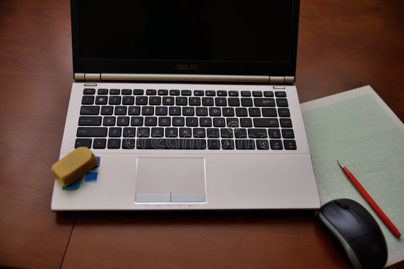 Laptop computer and tools stock image. Image of paper - 275244535