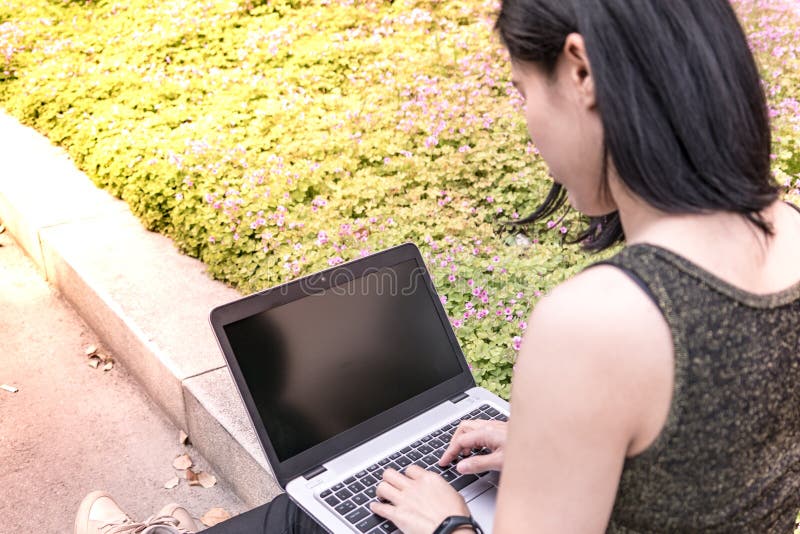 A Laptop Computer is Using for Surfing Internet by Student Women Stock ...