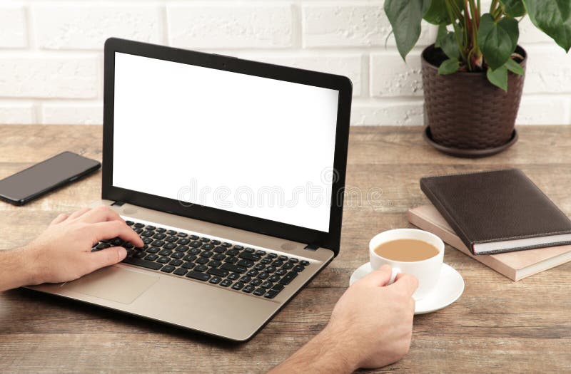 Laptop Computer White Blank Screen and Smartphone on Light Table. View ...