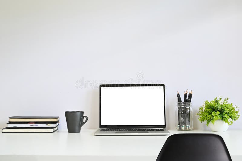 Laptop Computer on Workspace with Chair, Coffee, Notebook Paper and ...