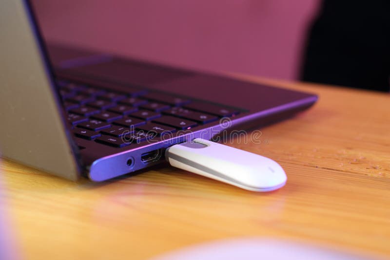 Laptop with Connected Gsm Modem on Table Stock Photo - Image of table ...