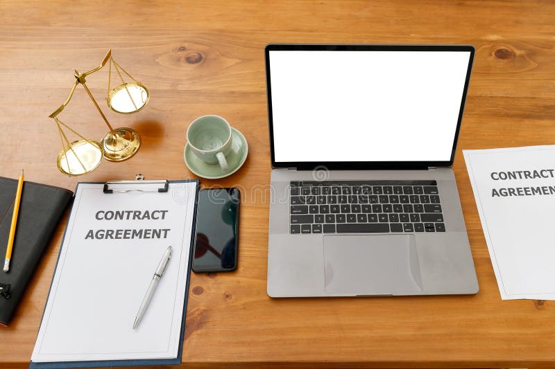 Laptop, Contract Documents and Brass Balance Scale on the Lawyer S Desk ...