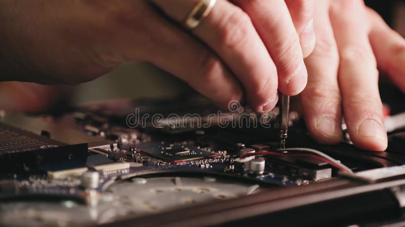 Laptop Cooling System Repair Disconnecting the Cable and Removing the ...