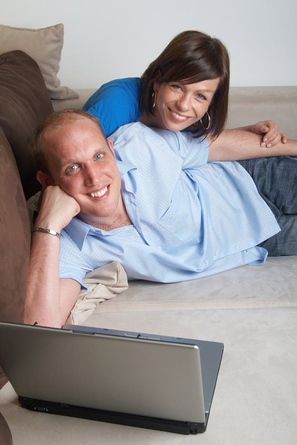 With laptop on couch stock image. Image of indoor, interior - 8198673