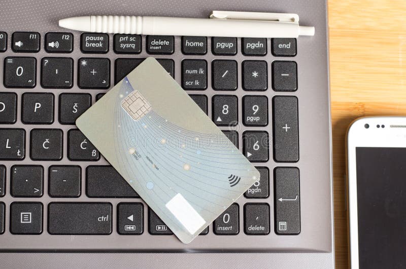 Laptop with credit card stock photo. Image of account - 64278874