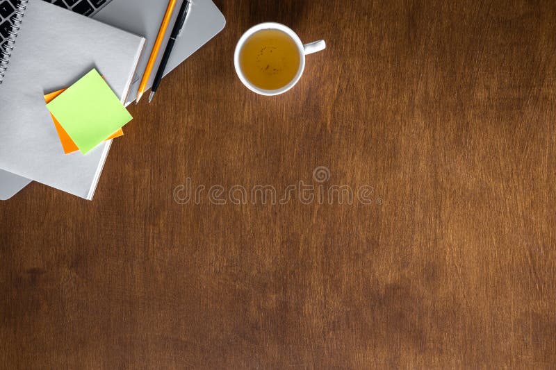 Laptop, Cup of Tea and Notepad on a Wooden Table, Top View. Stock Image ...