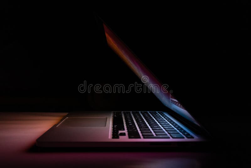 A Laptop in the Dark from the Side Stock Photo - Image of black, design ...
