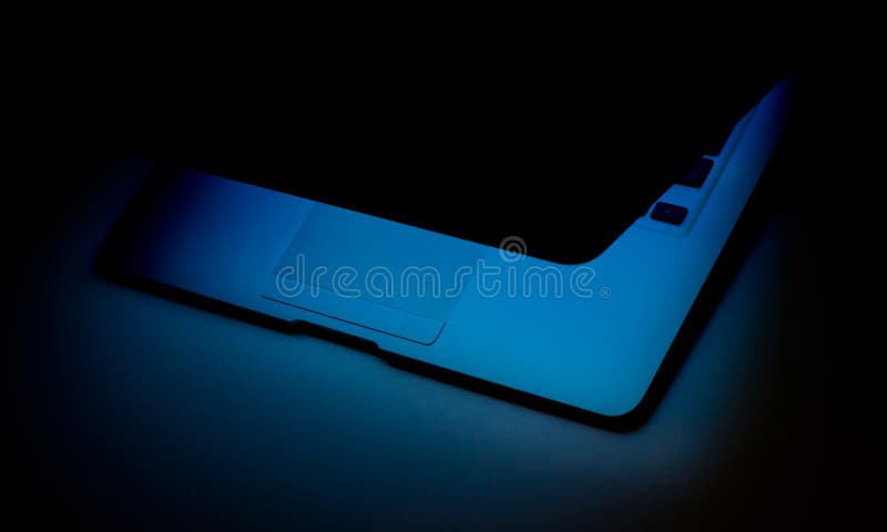 Laptop isolated in dark stock image. Image of silver - 26982543