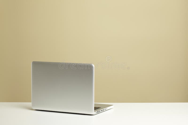 Laptop on desk stock photo. Image of technology, metal - 25745498