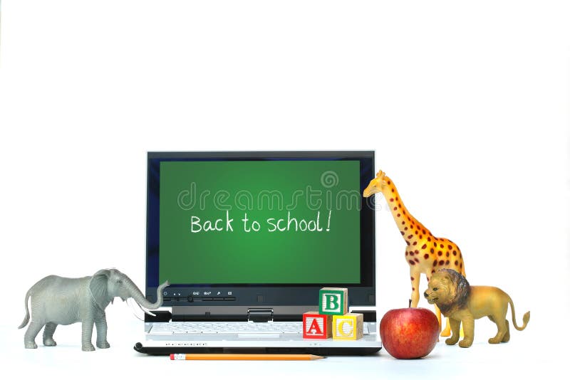 Laptop on Desk with Toy Animals and Apple Stock Image - Image of ...