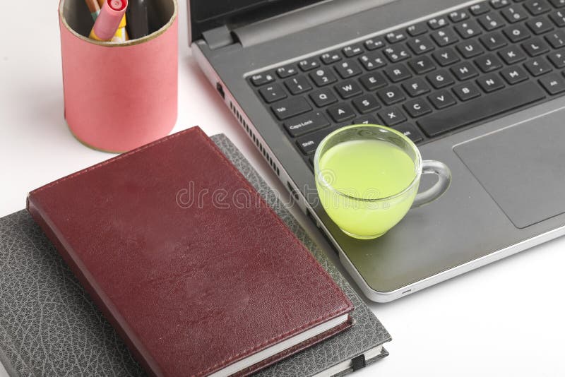 Laptop and Diary with Cup of Green Tea. Work from Home Concept Stock ...