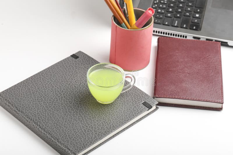 Laptop and Diary with Cup of Green Tea. Work from Home Concept Stock ...
