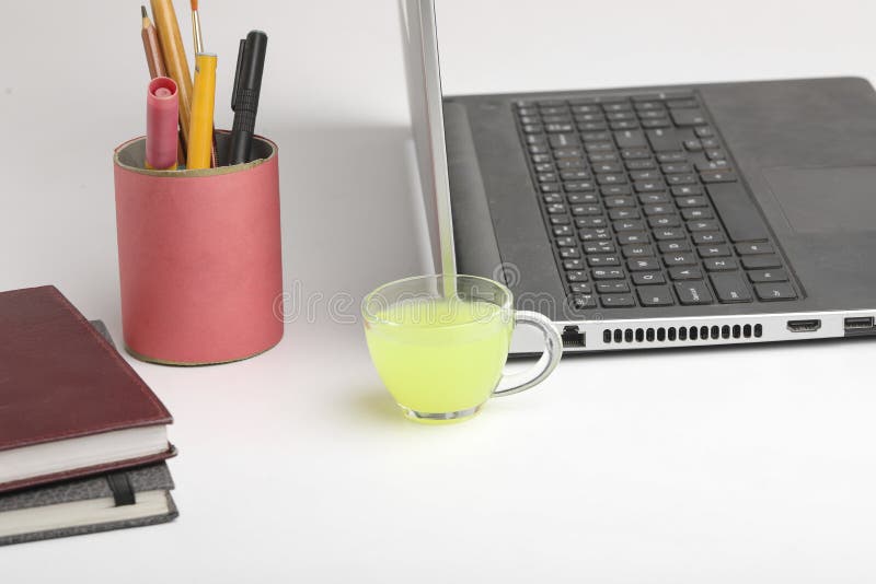 Laptop and Diary with Cup of Green Tea. Work from Home Concept Stock ...