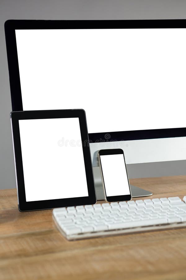 Laptop with Digital Tablet and Smartphone on Table Stock Photo - Image ...