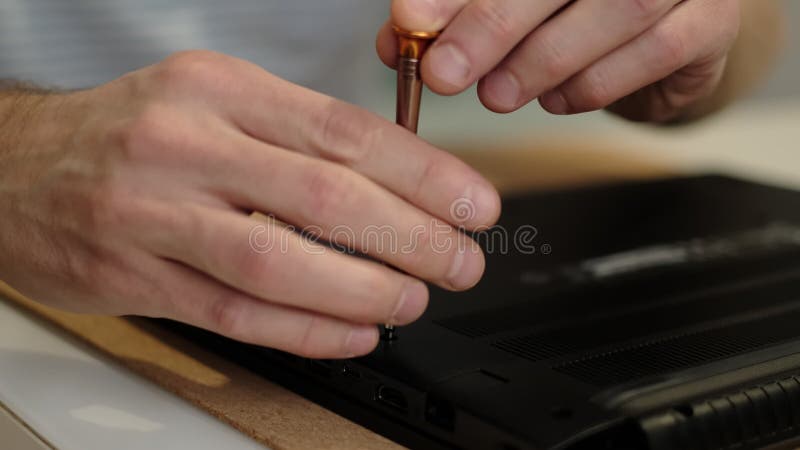Unrecognizable Engineer Separating Computer from Case. Electronic ...