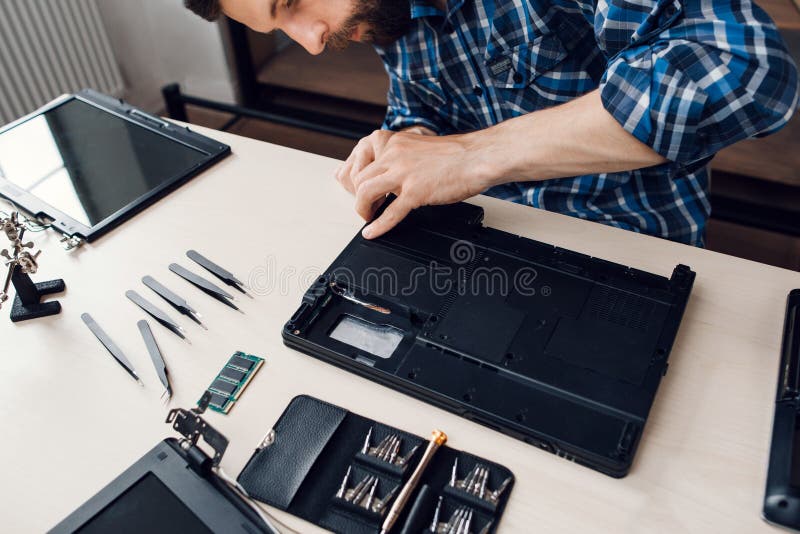 Laptop Disassembling with Screwdriver at Repair Stock Photo - Image of ...
