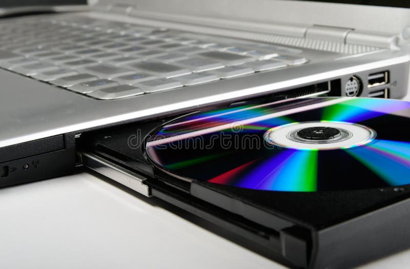 Laptop with disk stock image. Image of electronics, circle - 8048895