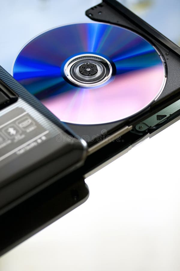 Laptop with a Disk Dvd. Close Up. Stock Image - Image of copy, compact ...