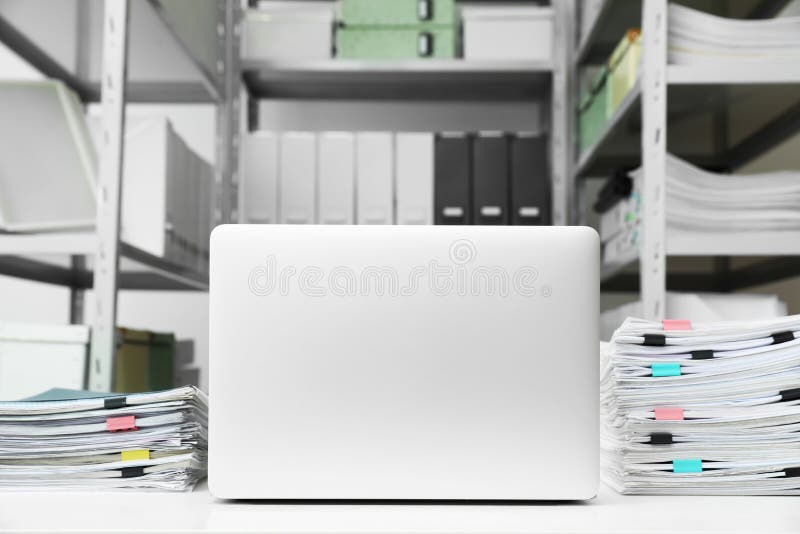 Laptop and Documents on Desk Stock Image - Image of paperwork, desk ...