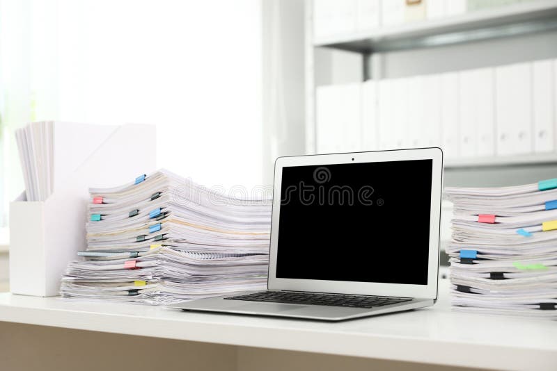 Laptop and Documents on Desk in Office Stock Photo - Image of documents ...