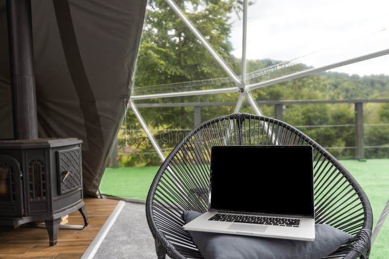 Laptop in the dome camping stock image. Image of computer - 274538019