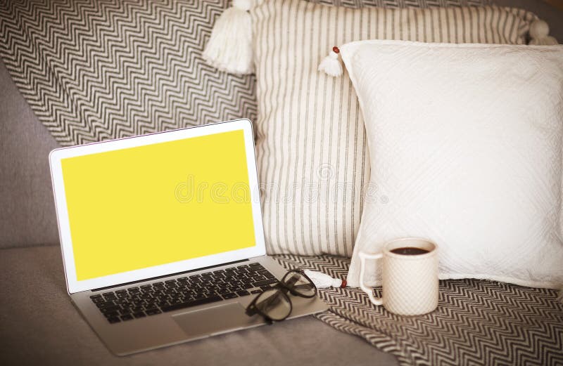 Laptop on sofa in room stock image. Image of contemporary - 204648271