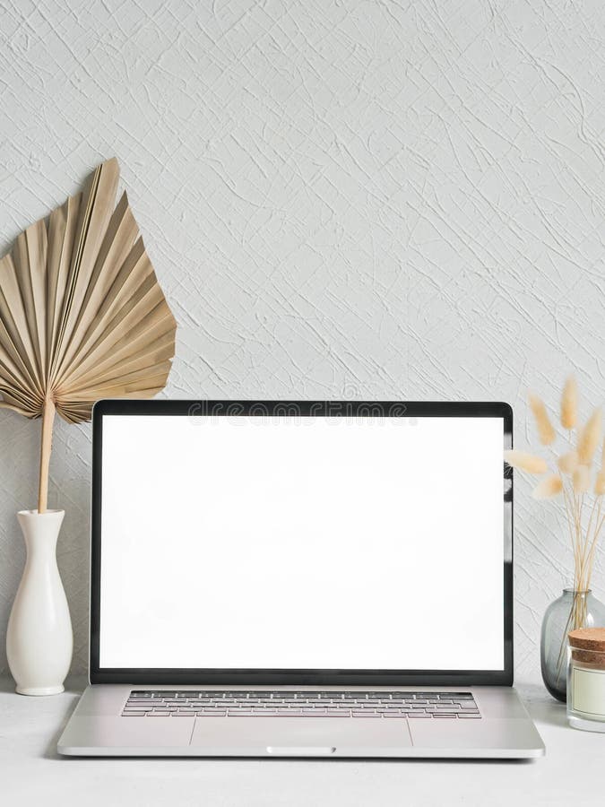 Laptop Empty Screen and Different Decoration Against the White Wall ...