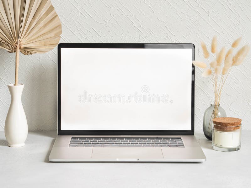 Laptop Empty Screen and Different Decoration Against the White Wall ...
