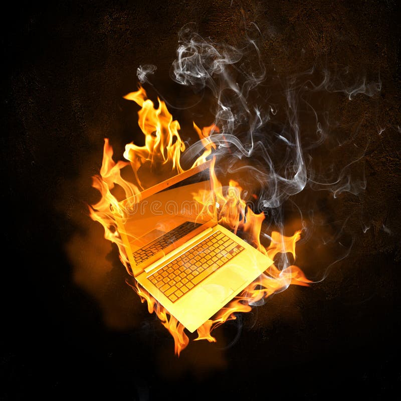 Laptop in fire flames stock image. Image of keyboard - 32884321