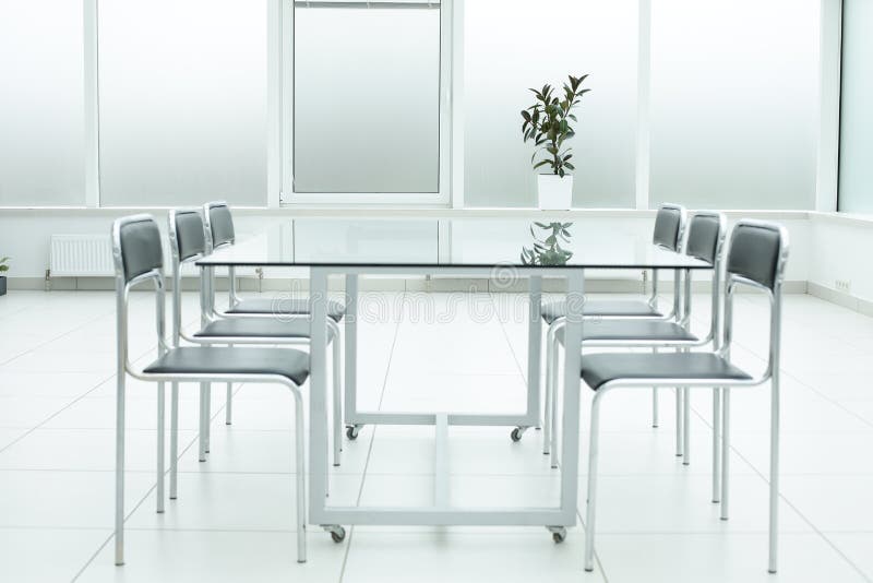 Laptop on Glass Table in Spacious Office Space Stock Photo - Image of ...